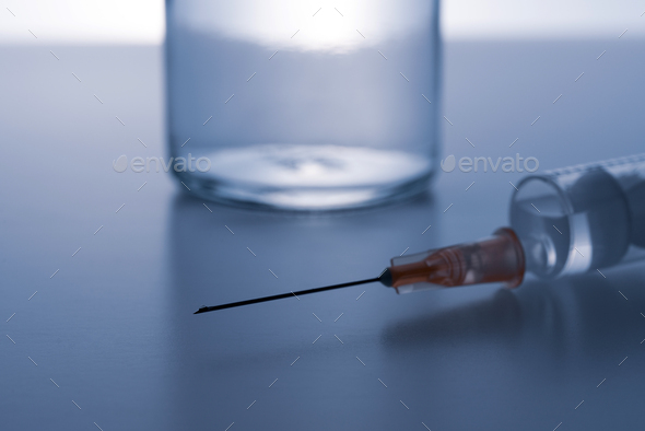 Bottle with solution for injection and syringe with drops on top Stock ...