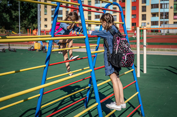 Elementary school students playing on the school playground. Stock ...