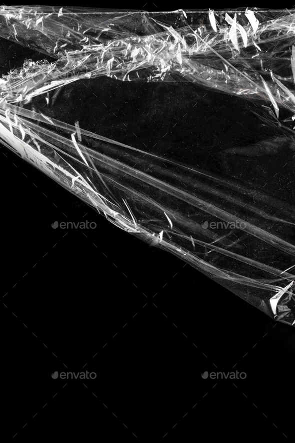 Wrinkled plastic wrap texture on a black background Stock Photo by Rawpixel