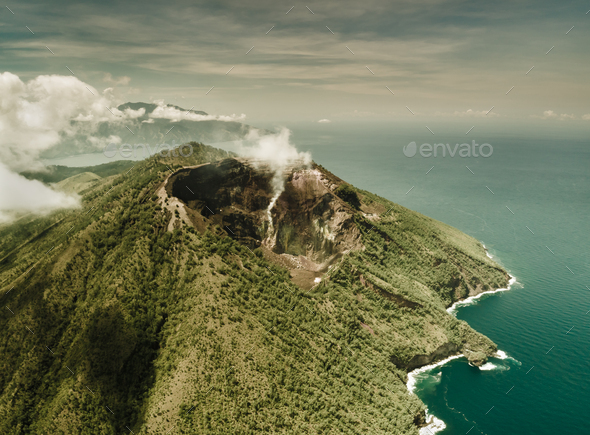 Active Indonesian volcano overview. Aerial shot Stock Photo by goinyk