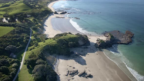 Aerial View of Anchor Bay Beach On A Sunny Day In Tawharanui Regional ...