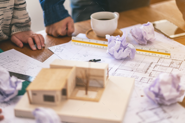 Group of an architect feel stressed after working on architecture model ...