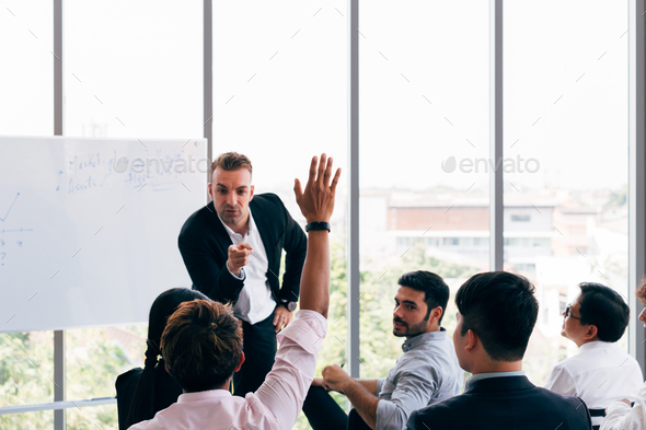 Speaker ready to answer question on conference Stock Photo by twinsterphoto