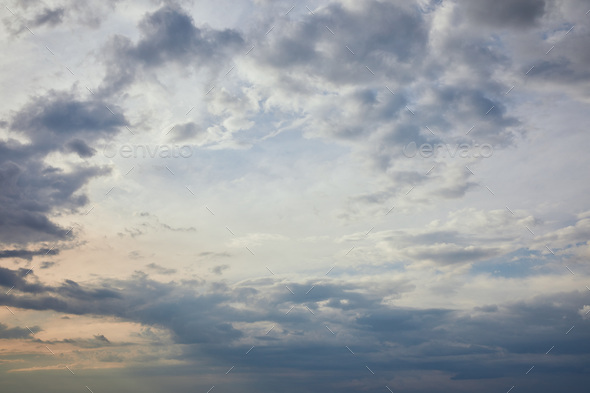 blue clouds on grey sky background and sun rays Stock Photo by ...