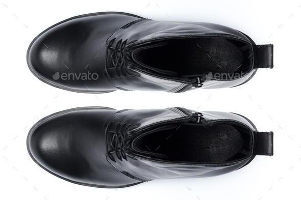 Boots isolated on white background. Top view Stock Photo by FabrikaPhoto