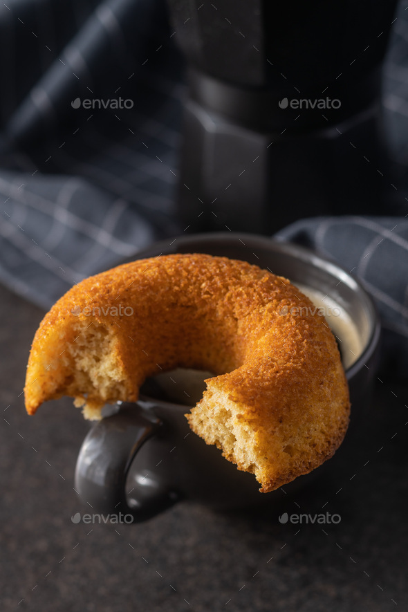 Round sponge cake dessert. Sweet donut with coffee cup Stock Photo by ...