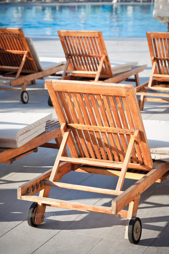 Hotel Poolside Chairs Stock Photo by nzooo | PhotoDune