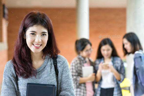 Portrait smilling and happy asian college student at campus with group ...