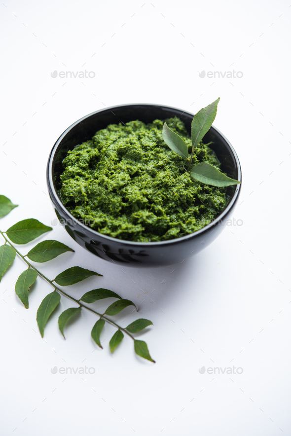 curry leaves or kadi patta chutney in a bowl Stock Photo by ...