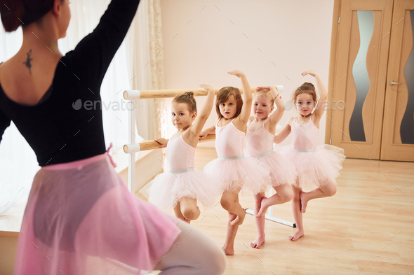 Practicing pose. Little ballerinas preparing for performance Stock ...
