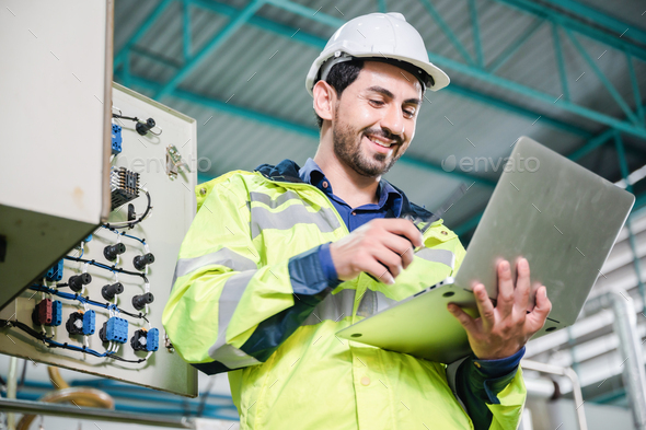 technician engineer working to maintenance a construction equipment ...