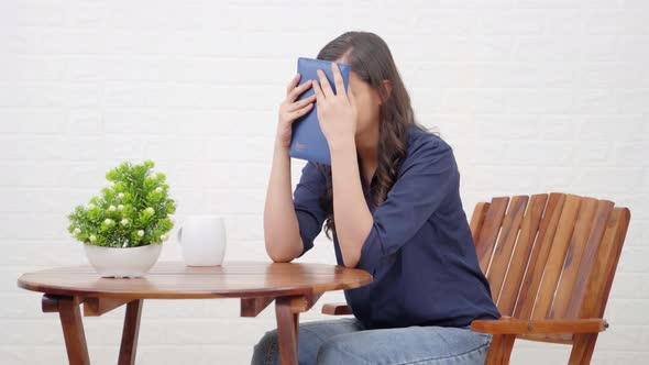 Disappointed Indian girl reading a book, Stock Footage | VideoHive