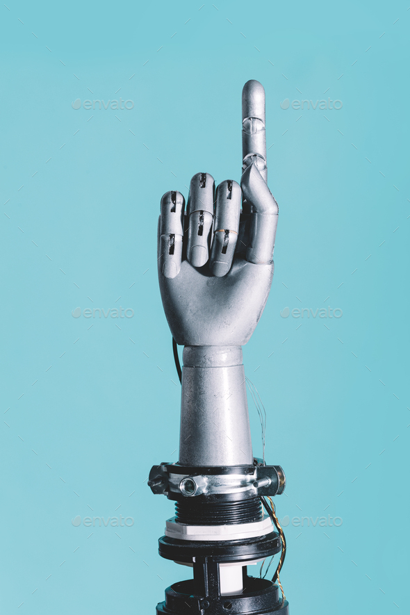 Robotic hand in retro future style pointing finger Stock Photo by photocreo
