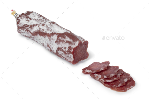 Sliced Saint Agaune sausage, a French pork saucisson, on white ...