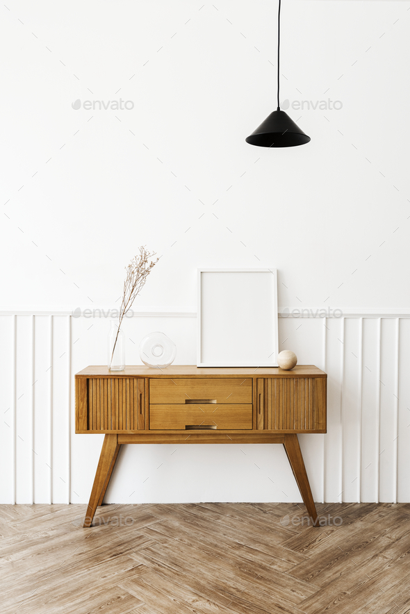 Picture frame on a wooden sideboard table Stock Photo by Rawpixel ...