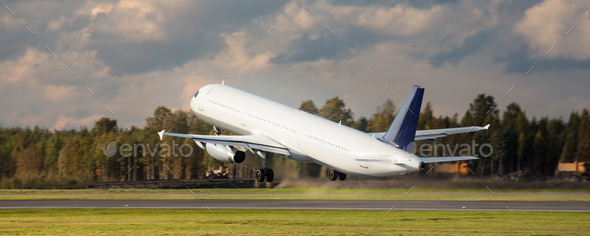Airplane take off runway from airport at daytime, back view. Aviation ...