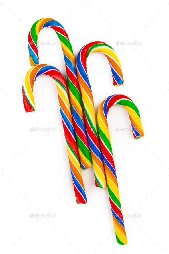 Rainbow colored candy cane isolated on white background Stock Photo by ...