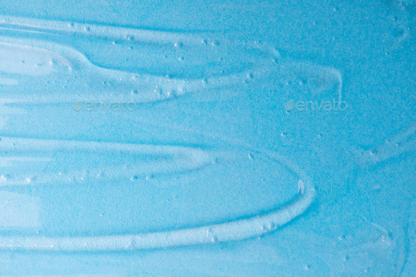 Cosmetics gel on blue. Texture of blue gel or sanitizer. Background ...