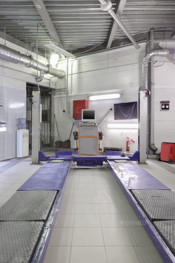 Empty auto repair shop. Stock Photo by Mint_Images | PhotoDune