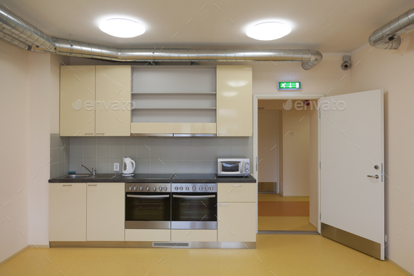 Modern youth hostel building. Kitchen with two ovens,kettle and toaster ...