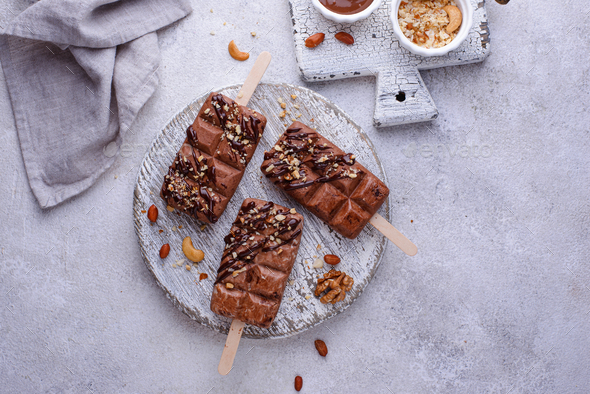 Chocolate ice cream popsicle with nut Stock Photo by furmanphoto ...