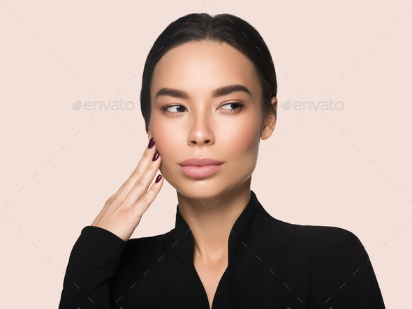 Asian beauty woman healthy natural make up clean skin touching her face ...