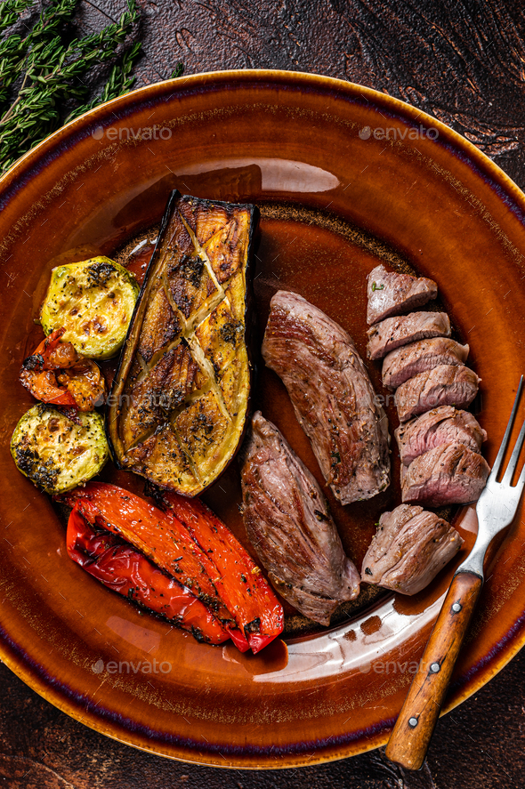 Grilled mutton tenderloin Fillet Meat, lamb sirloin on rustic plate ...