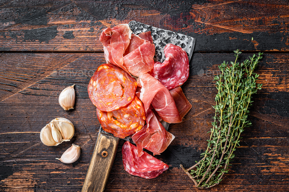 Spanish cured meat salami, jamon, choriso cured sausages on a meat ...