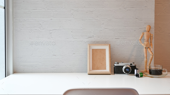 Photographer table with Camera film and film roll, photo frame and ...