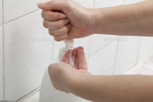 Using liquid soap Stock Photo by Impactphotography | PhotoDune