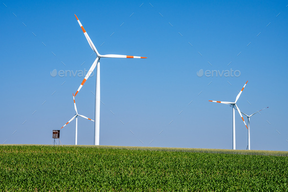 Modern wind turbines in a grainfield Stock Photo by elxeneize | PhotoDune