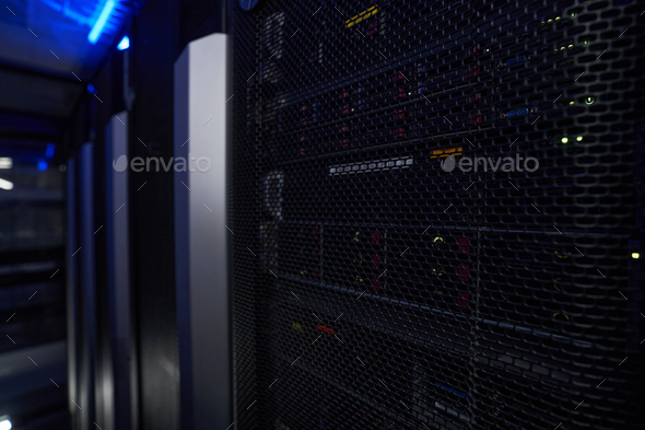 Modern interior of storage system with a lot of hard drives in data ...