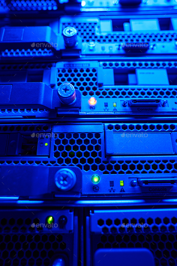 Image of server rack with a lot of hard drives and yellow indicators in ...