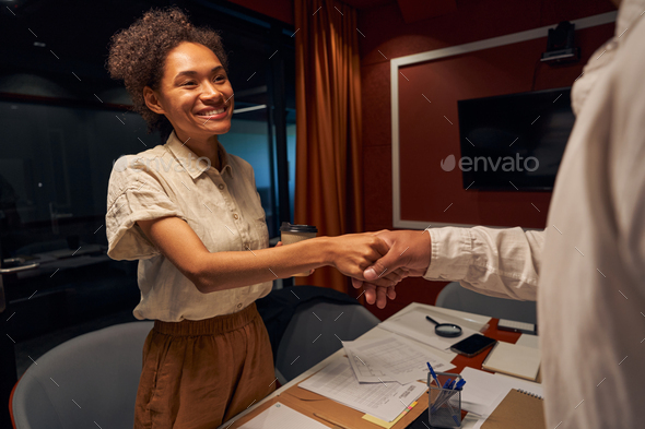American woman is preparing documents for presentation Stock Photo by ...