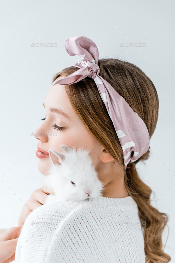 beautiful girl holding cute white rabbit isolated on white Stock Photo ...