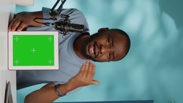 Vertical Video Blogger Vertically Holding Green Screen on Tablet and ...