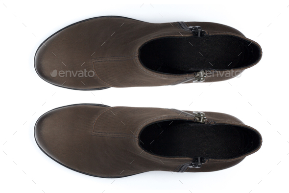 Boots isolated on white background. Top view Stock Photo by FabrikaPhoto