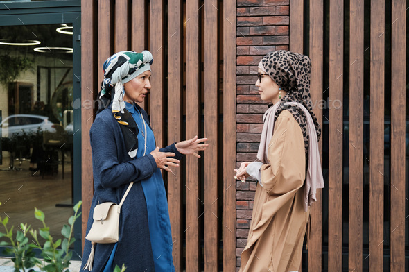 Muslim women meeting outdoors Stock Photo by AnnaStills | PhotoDune