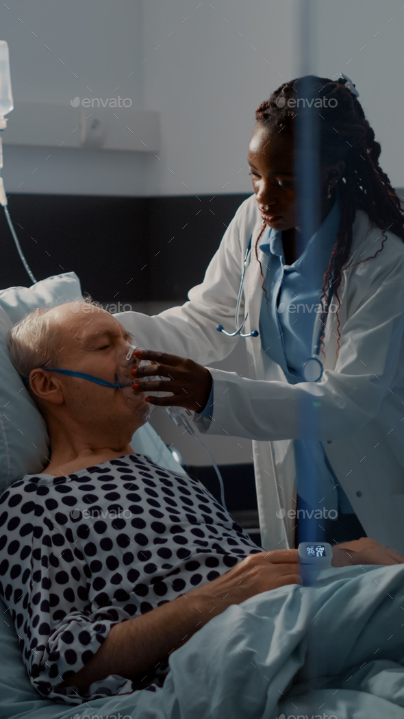 Patient with breathing problems in hospital ward bed Stock Photo by DC ...