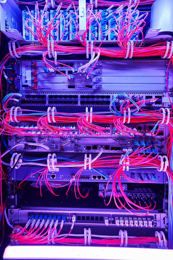 Arrangement of red fiber optic cables in server hardware Stock Photo by ...