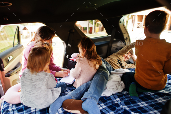 Children in trunk Stock Photo by ASphotostudio | PhotoDune