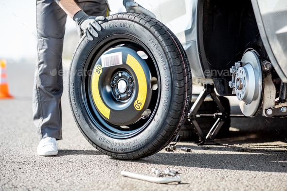 Changing wheel process Stock Photo by RossHelen | PhotoDune
