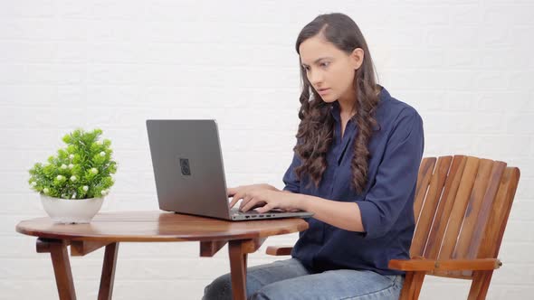 Indian girl working in an office, Stock Footage | VideoHive