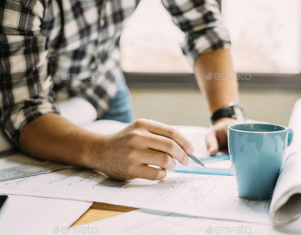 Man working on architectural design Stock Photo by hitdelight | PhotoDune