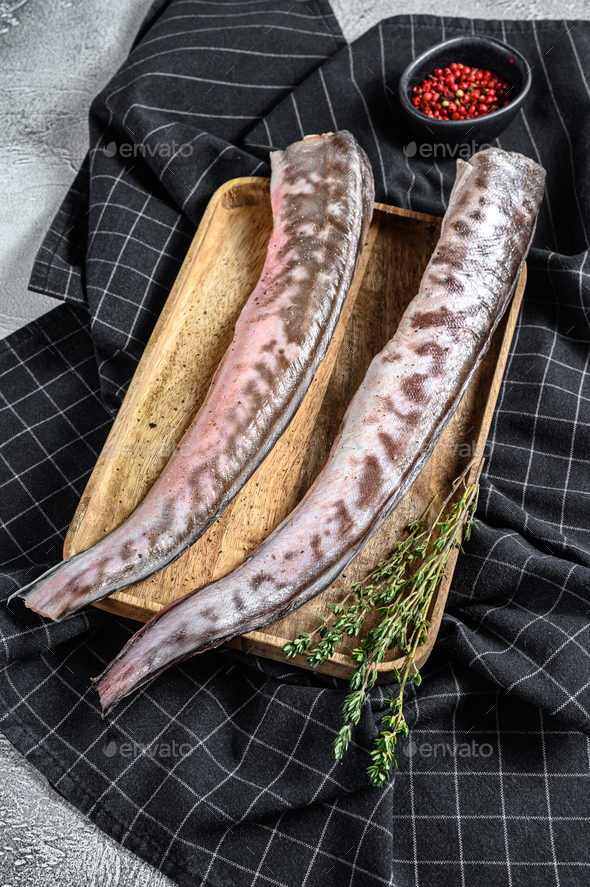 Raw sea eel fish with cooking ingredients. gray background. Top view ...