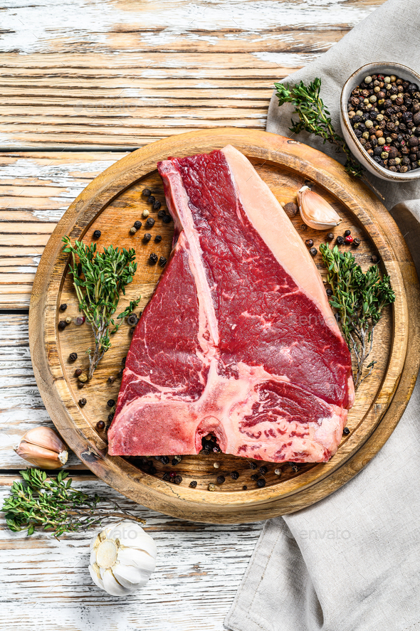 Porterhouse steak. Organic raw meat beef. White background. Top view ...