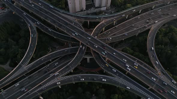 Aerial view of a busy road intersection in Shanghai at night, China ...