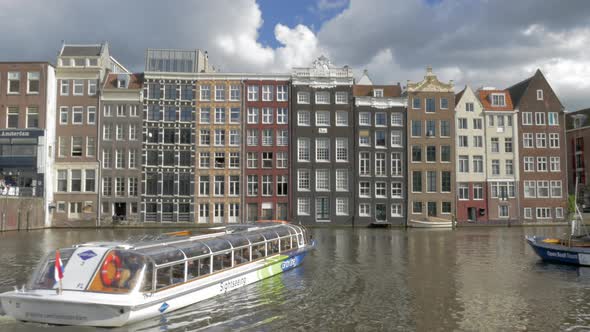 Timelapse of touristic water buses on Amsterdam canal, Stock Footage