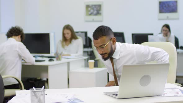 Arab Businessman Pushing-up on Desk, Stock Footage | VideoHive