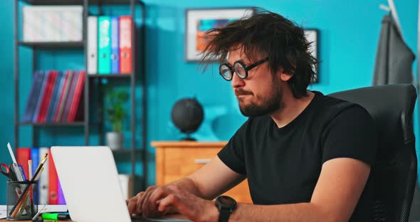 A Man with Scruffy Appearance Disheveled Brown Hair Wearing Black Thick ...
